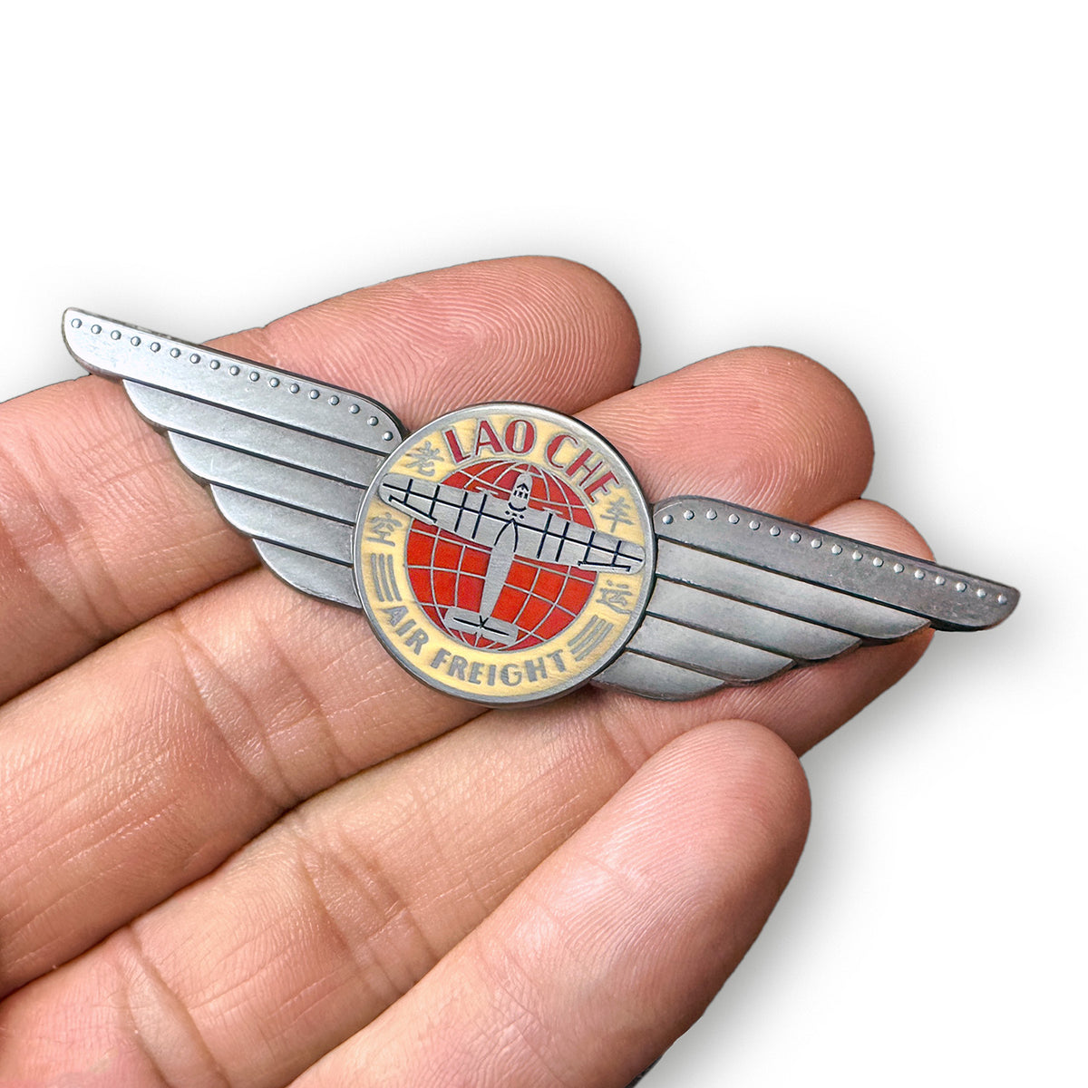 Lao Che Air Freight Enamel Pin – Antique Variant – Okkto